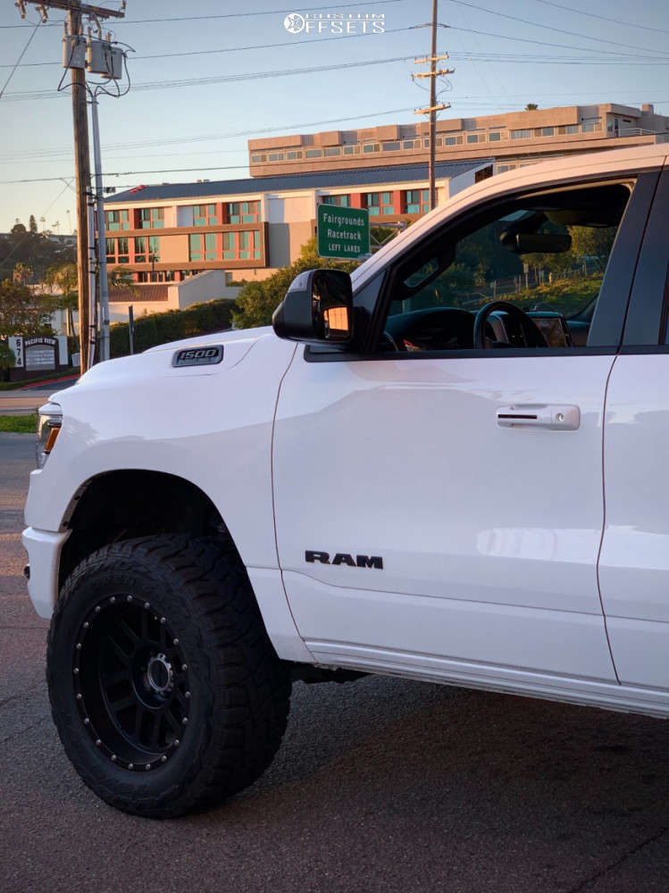 2019 Ram 1500 with 20x10 -24 Method Mr606 and 315/60R20 Toyo Tires Open ...