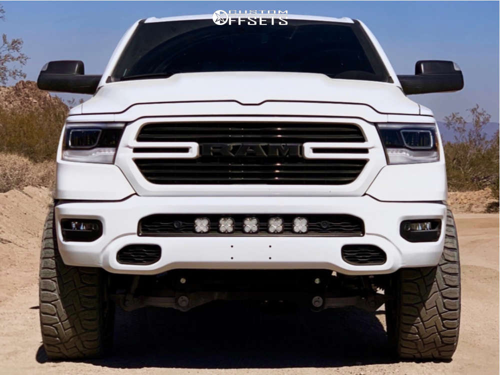 2019 Ram 1500 with 20x10 -24 Method Mr606 and 315/60R20 Toyo Tires Open ...