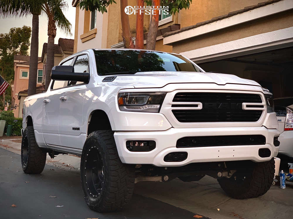 2019 Ram 1500 with 20x10 -24 Method Mr606 and 315/60R20 Toyo Tires Open ...