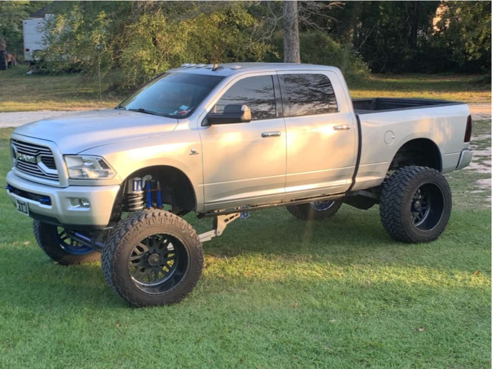 2014 Ram 2500 with 24x14 -74 American Force 0.01 and 40/15.5R24 Toyo ...