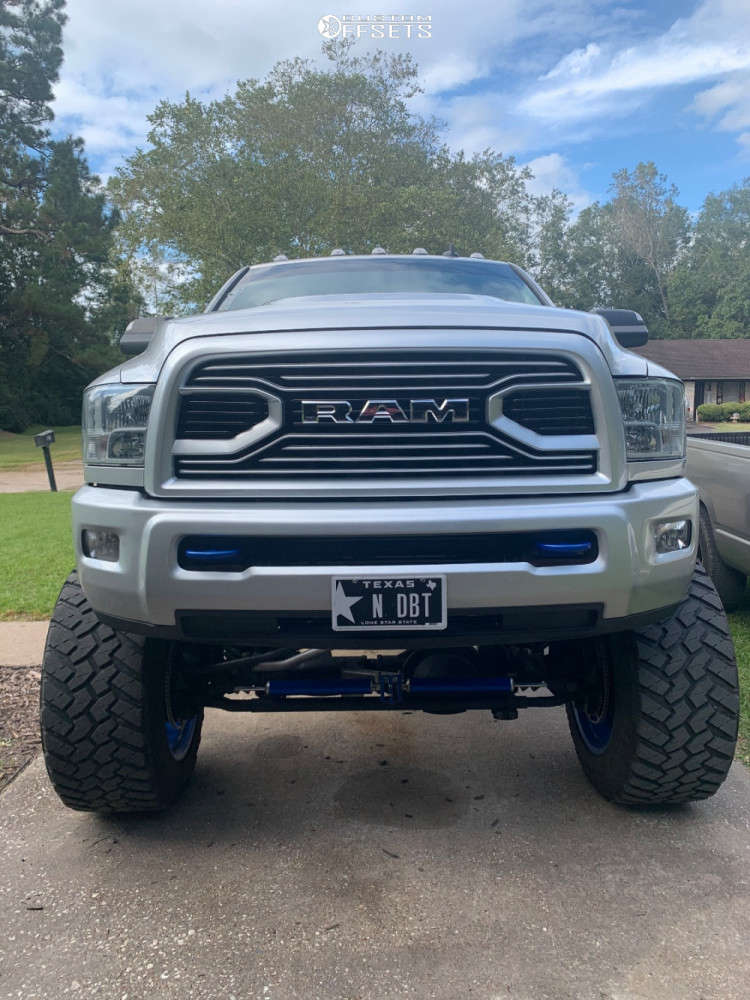 2014 Ram 2500 with 24x14 -74 American Force 0.01 and 40/15.5R24 Toyo ...