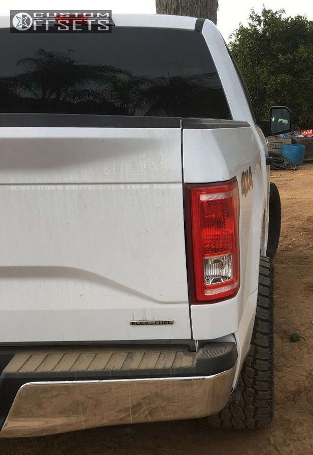 2015 Ford F-150 with 20x9 12 Black Rhino Glamis and 305/55R20 Toyo ...