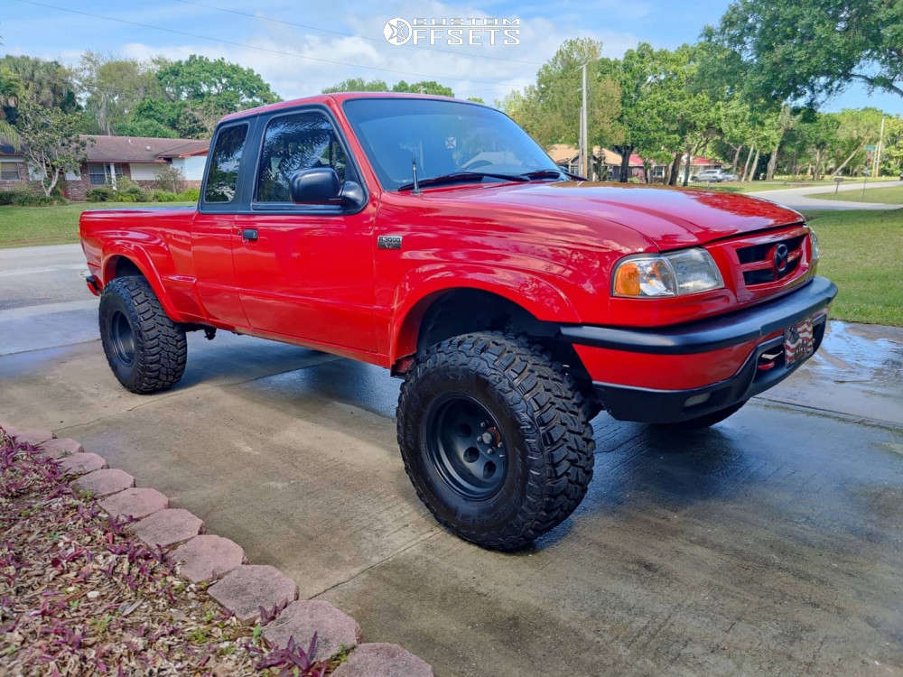 2001 Mazda B3000 with 15x10 -47 Pro Comp 69 and 33/12.5R15 Mastercraft ...
