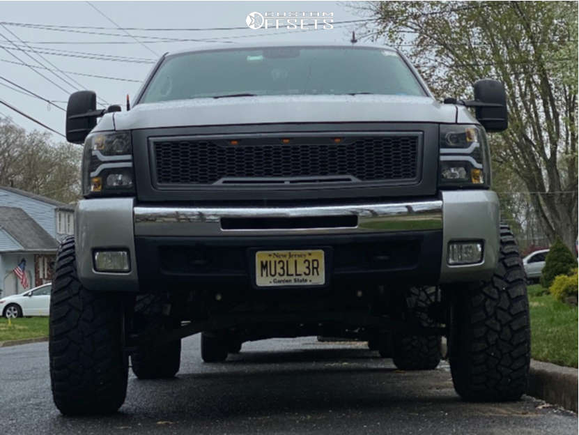 2011 Chevrolet Silverado 1500 with 22x12 -55 Hostile Jigsaw and 35/12 ...