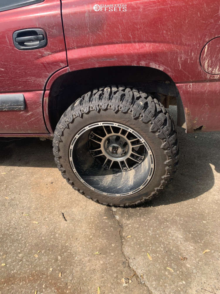 2002 Chevrolet Tahoe with 20x14 -76 XD Riot and 33/15.5R20 Atturo Trail ...