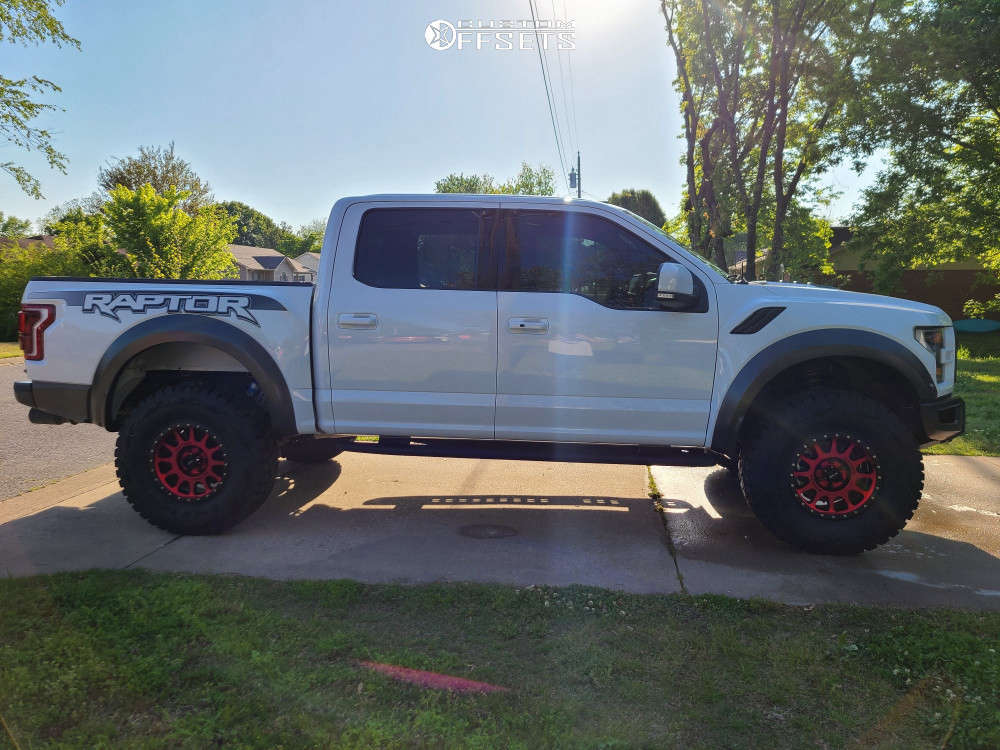 White Ford Raptor Lifted