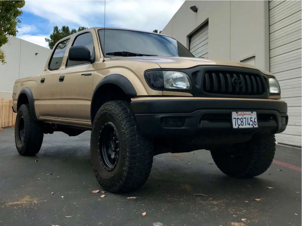 2003 Toyota Tacoma with 16x8 0 Raceline Defender and 33/11.5R16 Falken ...