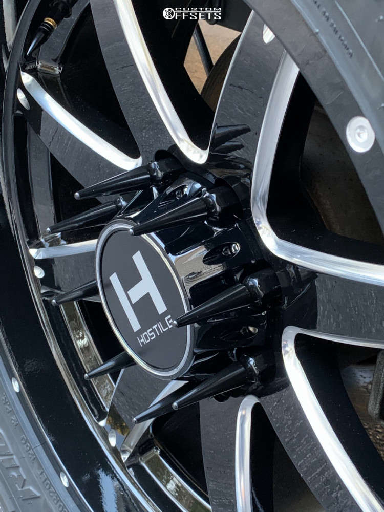 2018 Ram 2500 with 20x9 12 Hostile Alpha and 35/12.5R20 Nitto Ridge ...