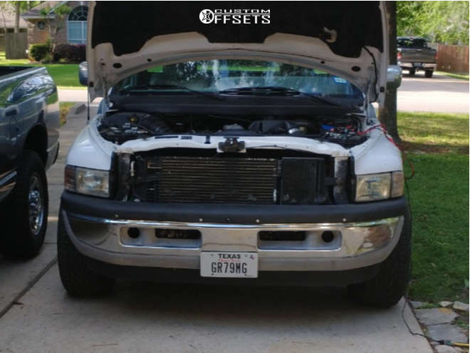 1994 Dodge Ram 2500 with 16x10 -25 Pro Comp 1069 and 265/65R16 General ...