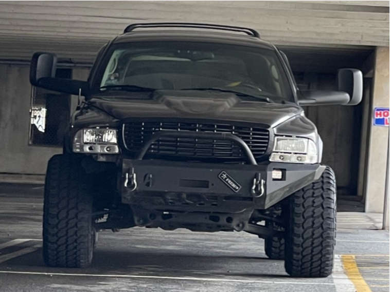 2002 Dodge Durango with 20x12 -44 Anthem Off-Road Avenger and 33/12 ...