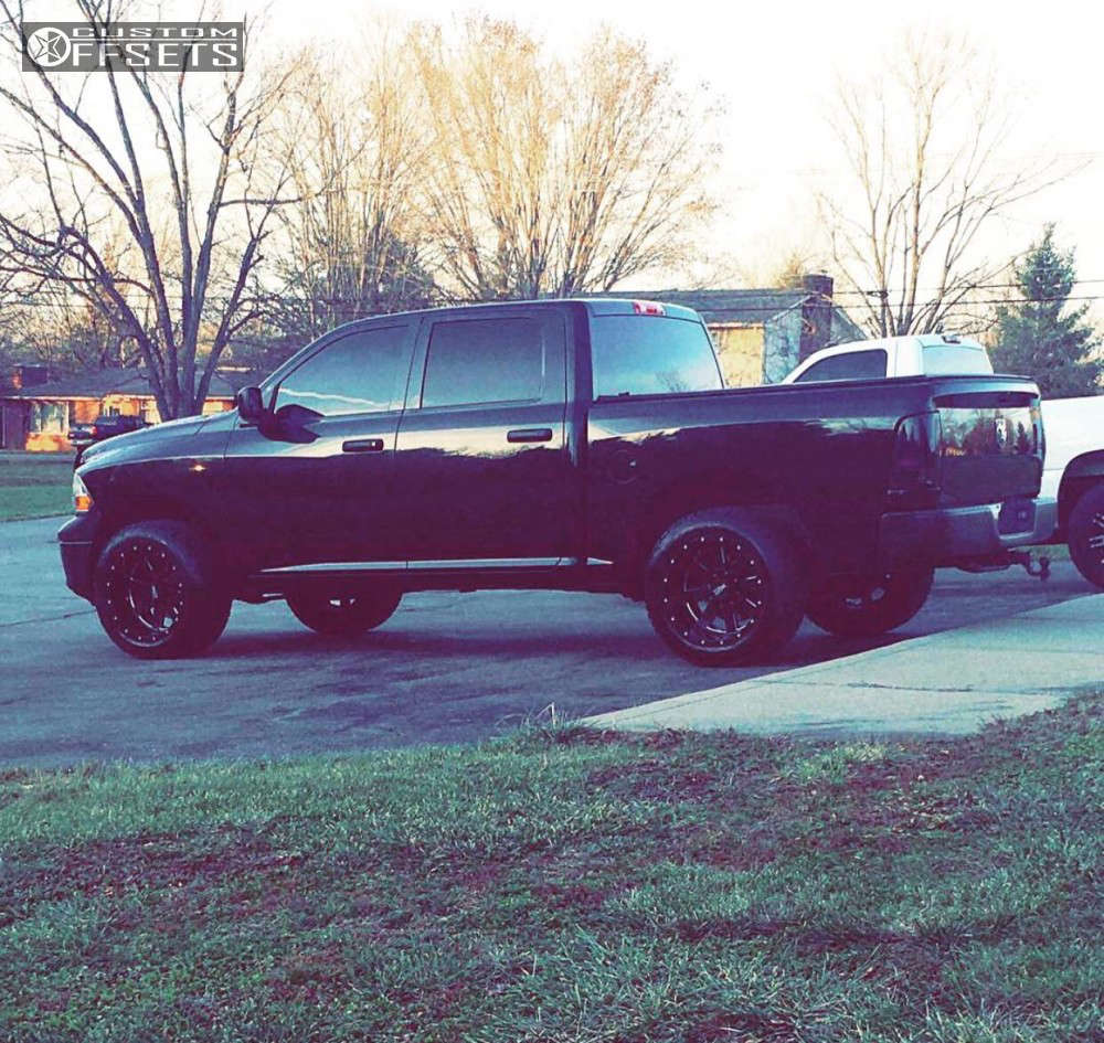 2010 Ram 1500 with 20x12 -44 Moto Metal MO962 and 33/12.5R20 Nitto ...