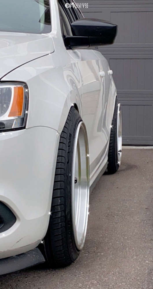 2013 Volkswagen Jetta with 18x10 25 JNC 005 and 225/40R18 Crossleader ...