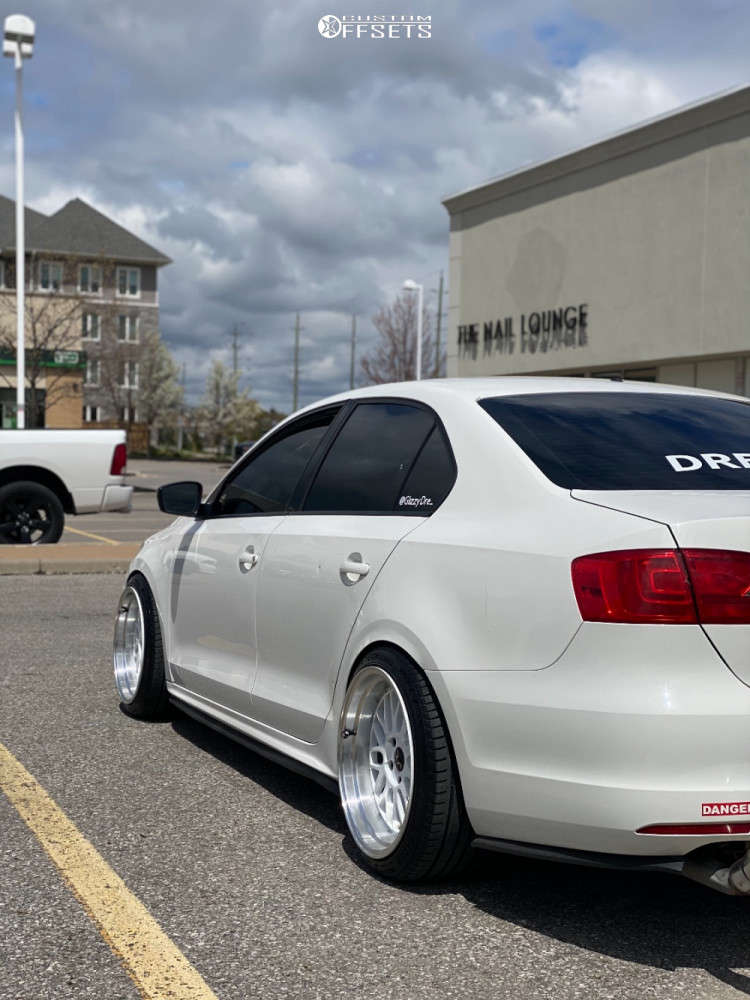 2013 Volkswagen Jetta with 18x10 25 JNC 005 and 225/40R18 Crossleader ...