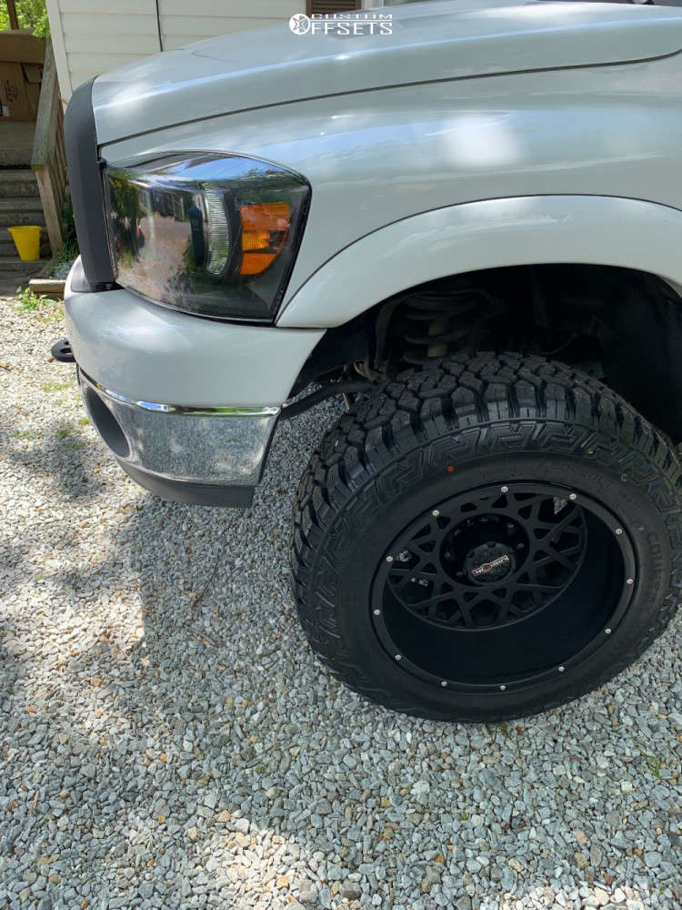 2007 Dodge Ram 2500 with 20x12 -44 Vision Rocker and 35/12.5R20 Fury ...