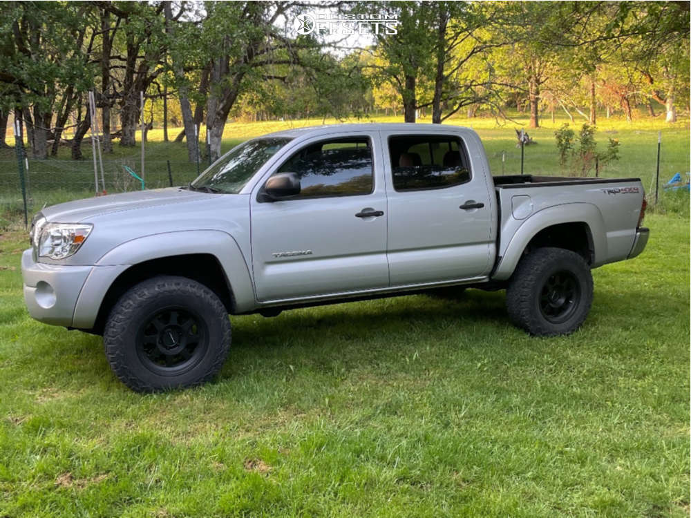 2009 Toyota Tacoma with 17x8.5 0 Method Mr701 and 32/11.5R17 BFGoodrich ...