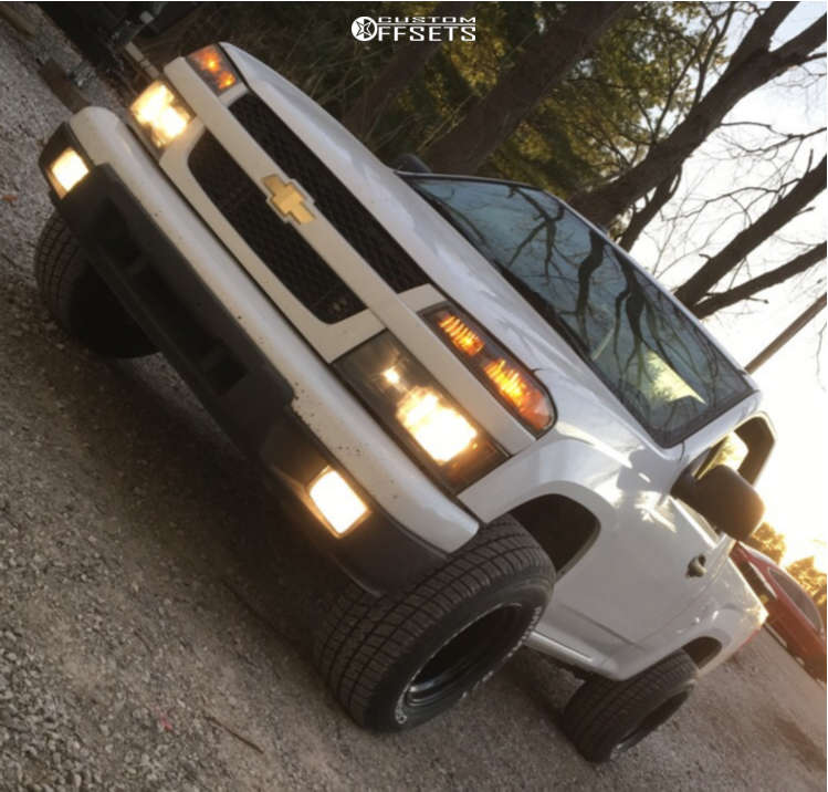 2012 Chevrolet Colorado with 15x10 -44 Pro Comp 52 and 27/10.5R15 ...