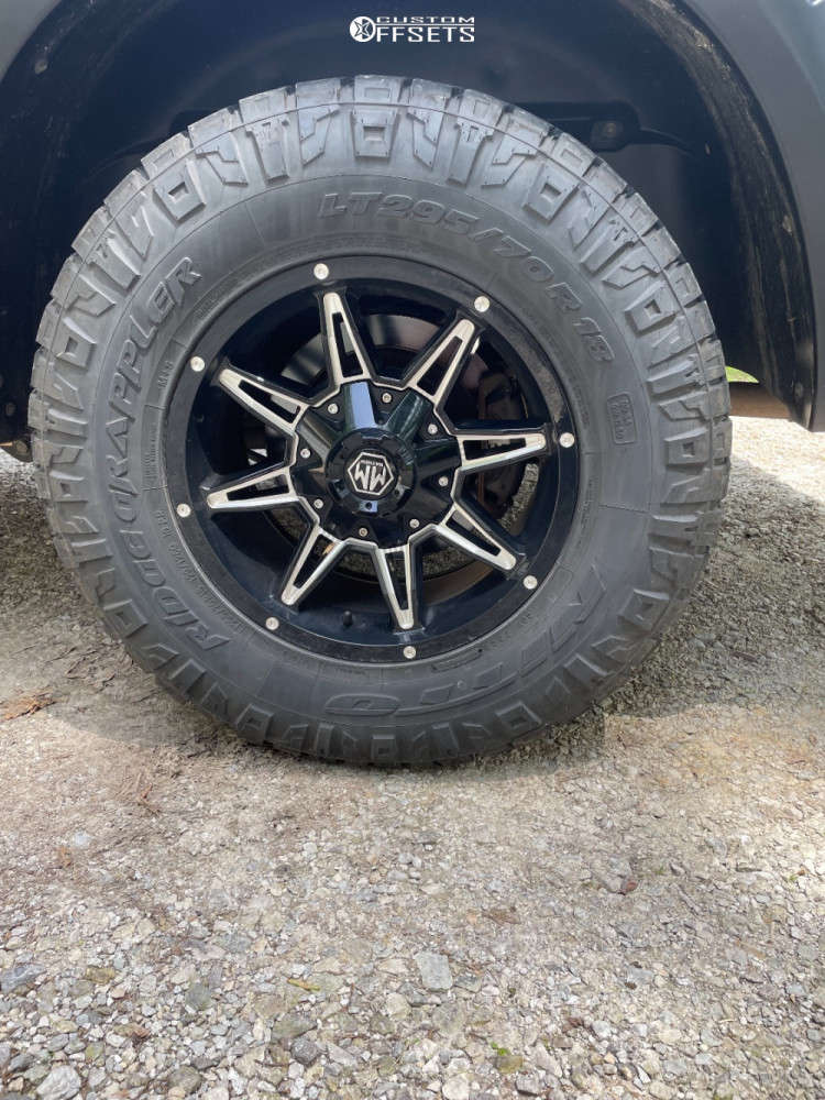 2012 Ram 1500 with 18x9 -12 Mayhem Rampage 8090 and 295/70R18 Nitto ...