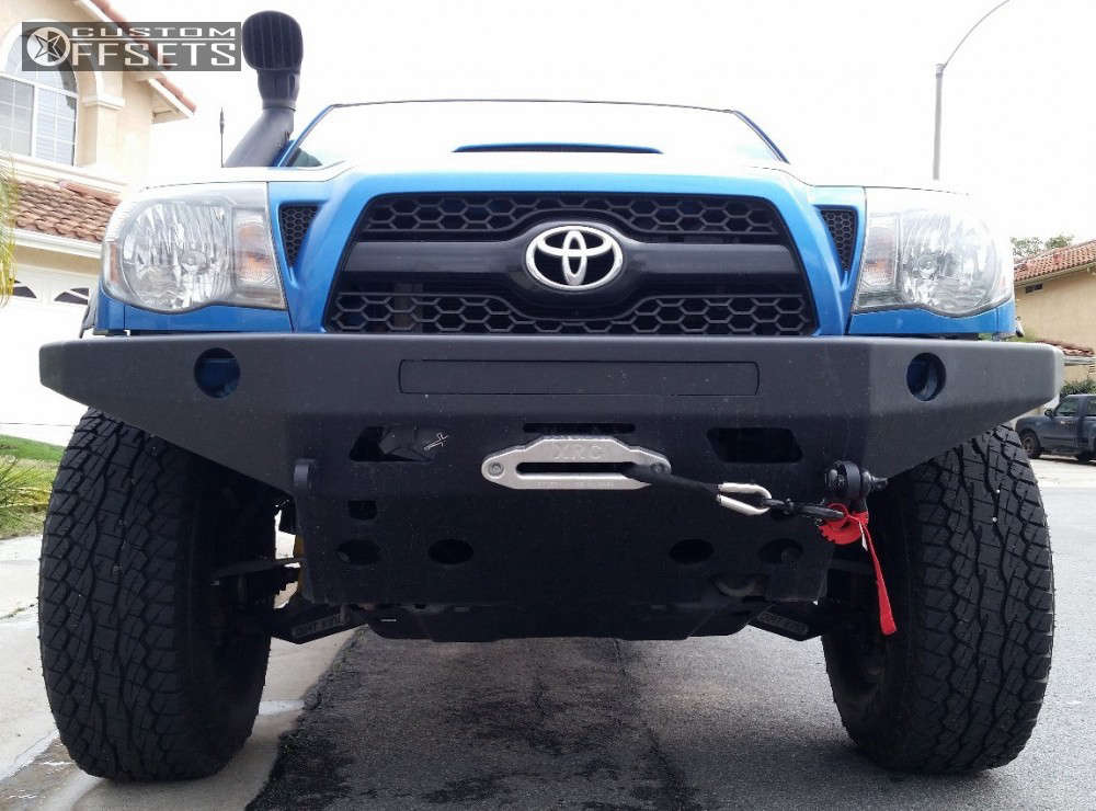 2011 Toyota Tacoma with 17x9 -12 Ultra Gauntlet and 315/70R17 Falken ...