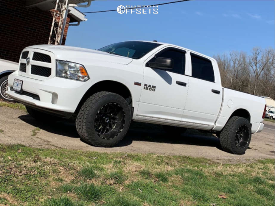 2016 Ram 1500 with 20x12 -44 TIS 544BM and 33/12.5R20 Toyo Tires Open ...