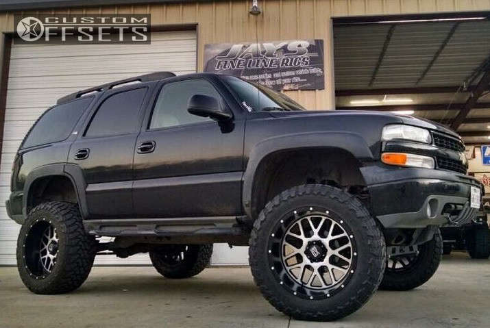 2004 Chevrolet Tahoe with 22x12 -44 XD XD820 and 37/13.5R22 Toyo Tires ...