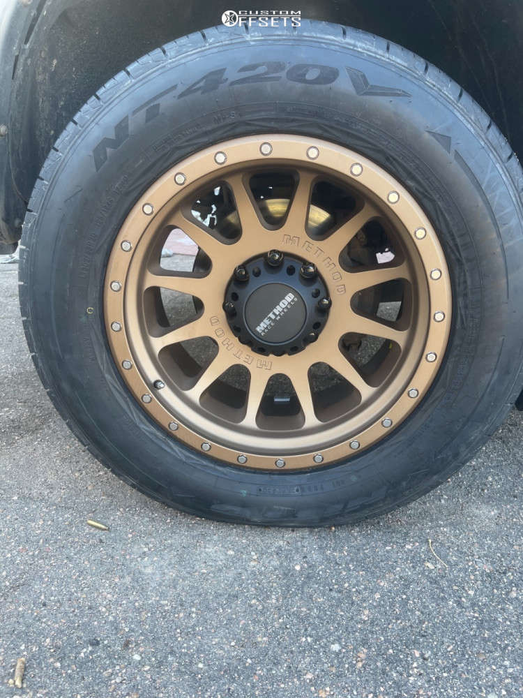 2008 Dodge Ram 2500 with 20x10 -24 Method Mr605 and 305/55R20 Nitto ...