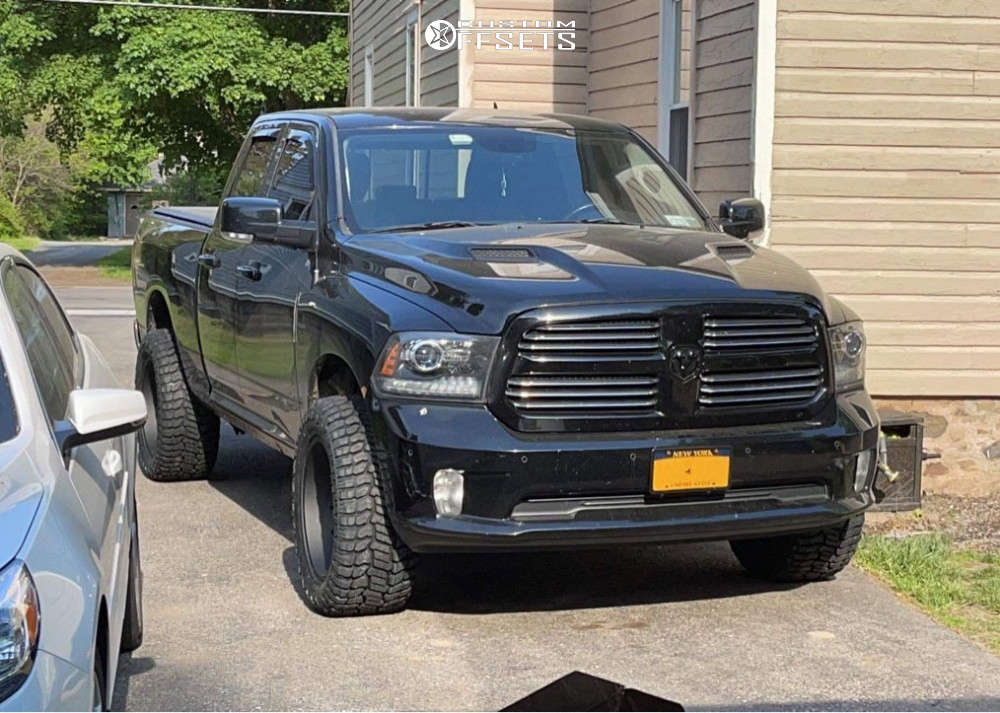 2014 Ram 1500 with 20x10 -25 Vision Sliver and 305/55R20 Radar Renegade ...