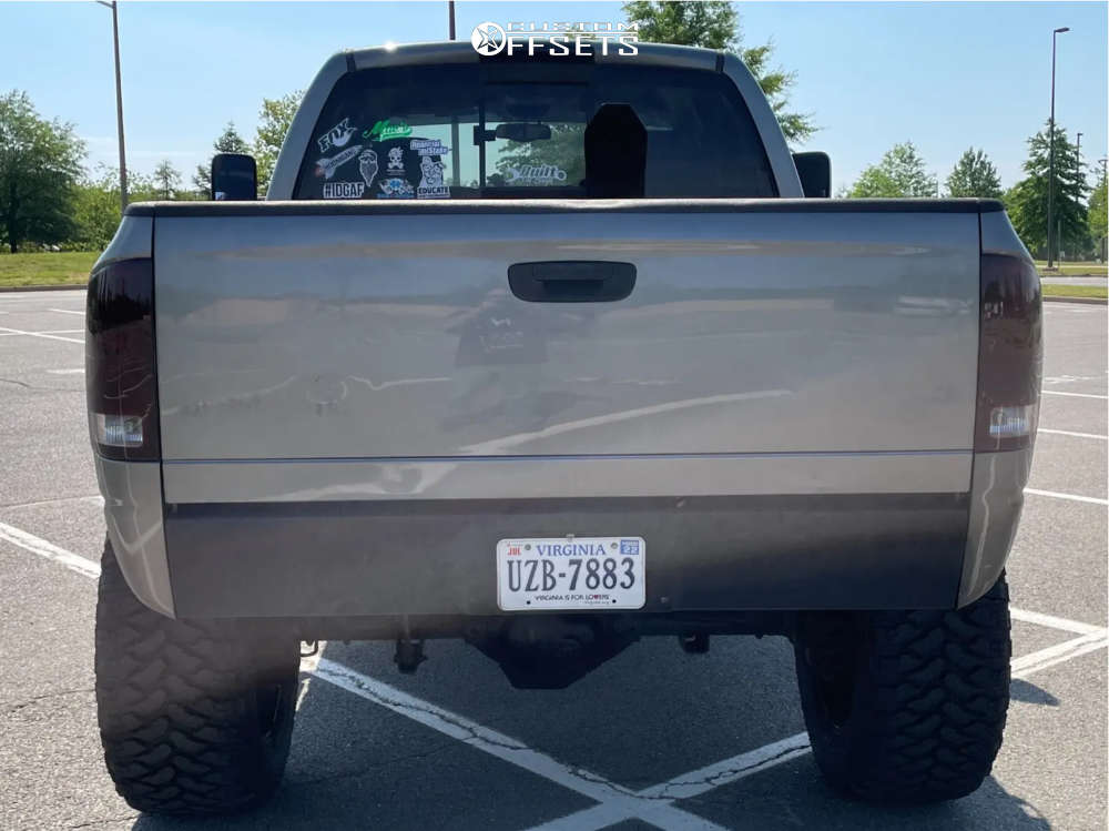 2005 Dodge Ram 2500 with 24x12 -44 Axe Offroad Hades and 40/15.5R24 RBP ...