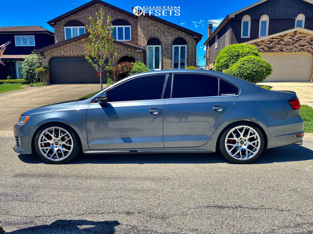 2012 Volkswagen Jetta with 18x8 45 Alzor 349 and 225/40R18 Achilles A/t ...