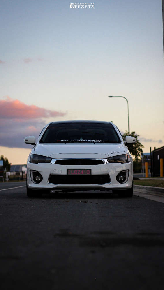 2016 Mitsubishi Lancer with 18x8.75 35 XXR 527 and 225/45R18 Monsta ...