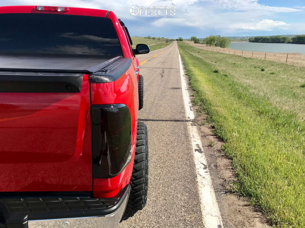 2011 Chevrolet Silverado 1500 with 20x12 -44 Ballistic Rage and 33/12 ...