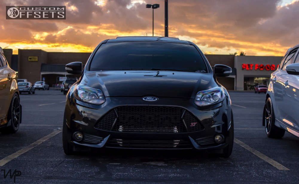 2013 Ford Focus with 18x9.5 38 Ambit RE82 and 235/40R18 Kumho Ecsta and ...