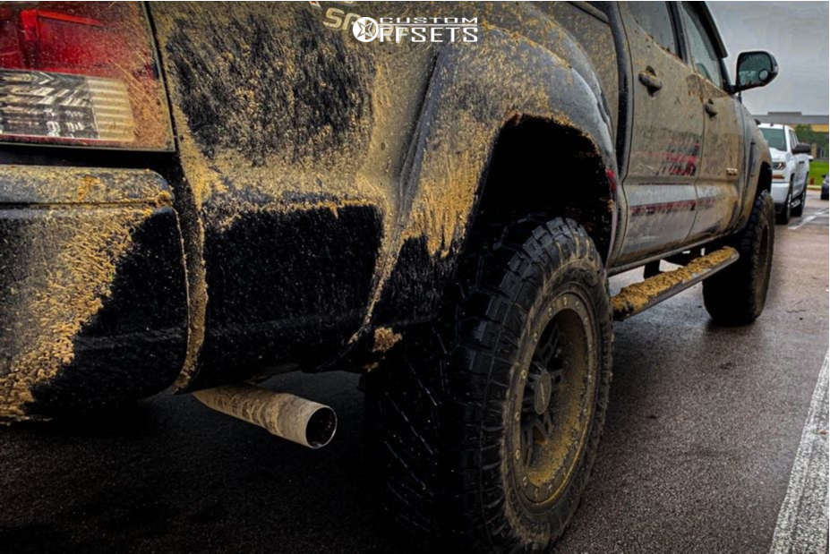 2012 Toyota Tacoma with 17x9 -6 Pro Comp 31 and 285/70R17 Nitto Ridge ...