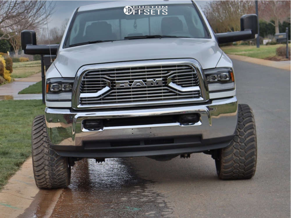 2018 Ram 2500 with 24x14 0 TIS Forged 544bm and 33/13.5R24 AMP Mud ...