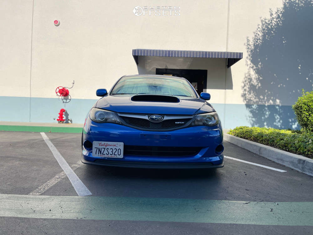 2009 Subaru Impreza with 18x8 40 OZ Racing Vela and 235/40R18 General G ...