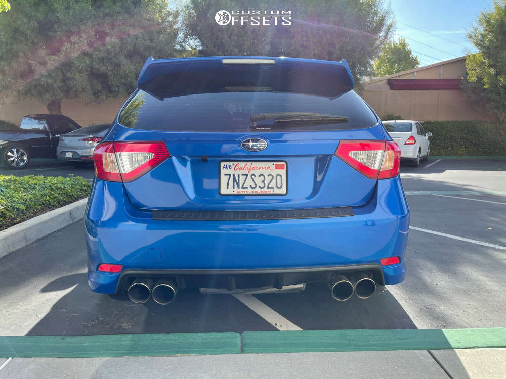 2009 Subaru Impreza with 18x8 40 OZ Racing Vela and 235/40R18 General G ...