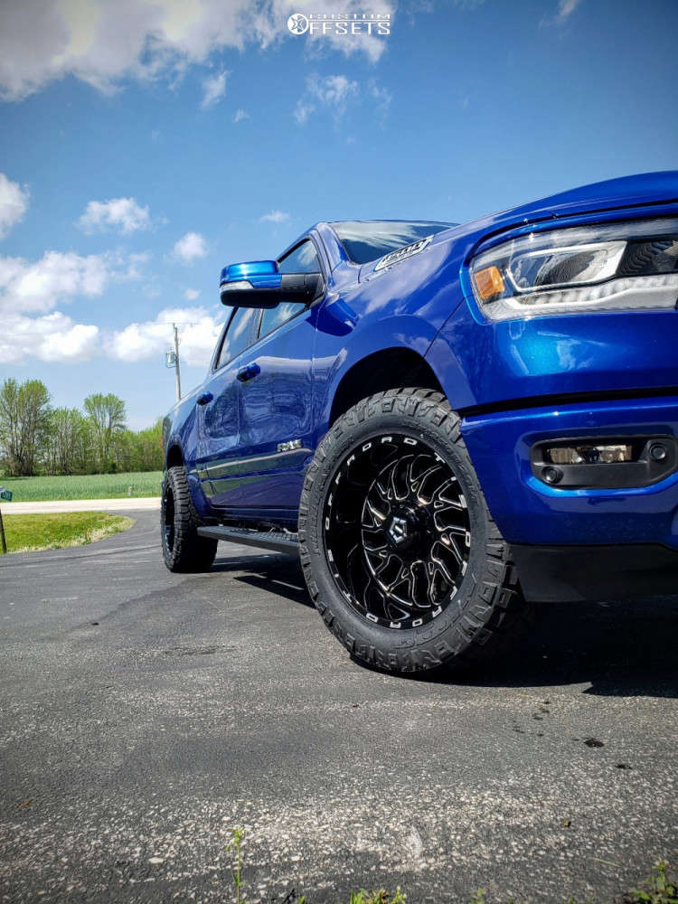 2019 Ram 1500 with 20x10 -25 TIS 544BM and 33/12.5R20 Nitto Ridge Grappler and Stock | Custom ...