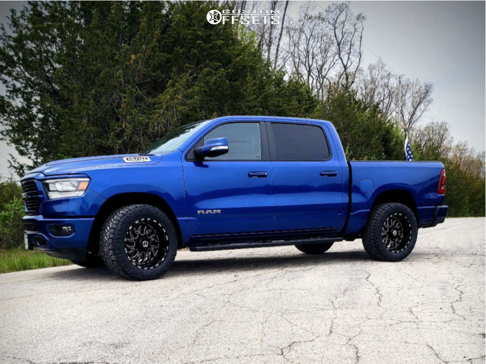 2019 Ram 1500 with 20x10 -25 TIS 544BM and 33/12.5R20 Nitto Ridge ...