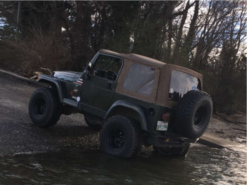 1998 Jeep TJ with 15x10 -47 Pro Comp Series 69 and 35/12.5R15 Cooper ...
