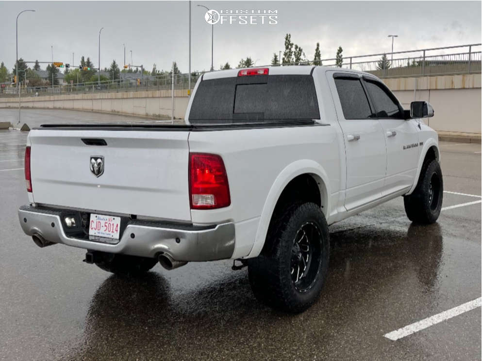 2011 Ram 1500 with 20x10 -18 Fuel Triton and 35/12.5R20 Toyo Tires Open ...
