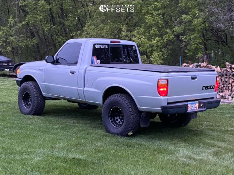 2002 Mazda B2300 with 15x8 -19 Pro Comp Series 252 and 32/11.5R15 ...