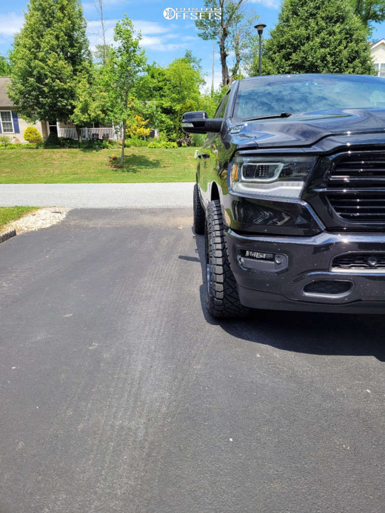 2019 Ram 1500 with 20x10 -24 Vision Razor and 32/10.5R20 Nitto Ridge ...