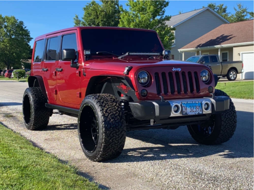 2011 Jeep Wrangler with 22x12 -51 Vision Rocker and 33/12.5R22 Venom ...