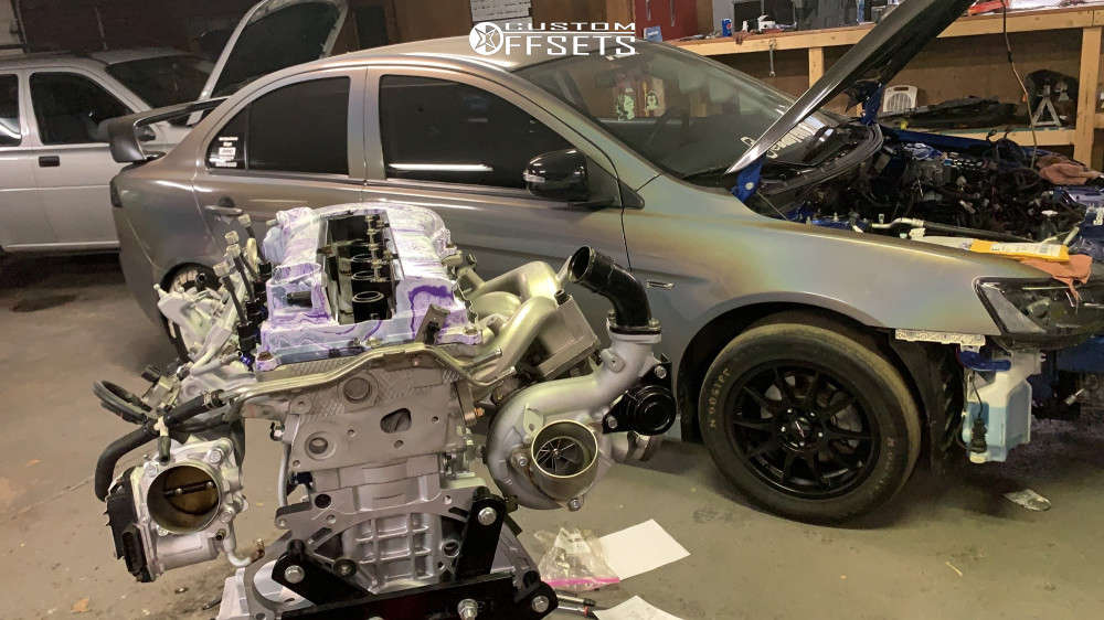 2016 Mitsubishi Lancer with 18x9.5 35 ARC Ar9 and 235/40R18 Achilles ...