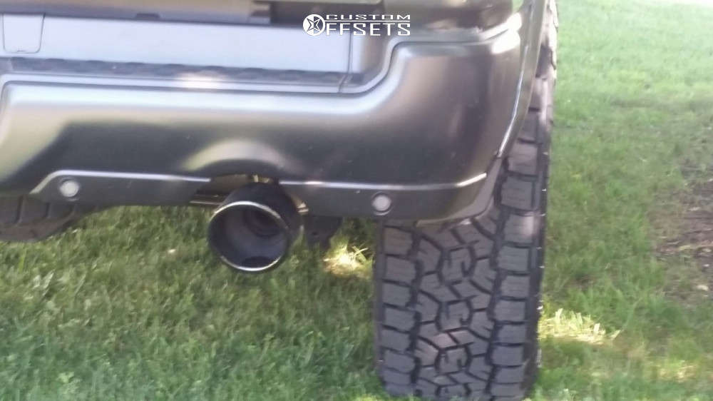 2021 Ram 1500 with 20x9.5 -12 Black Rhino Abrams and 295/60R20 Toyo ...