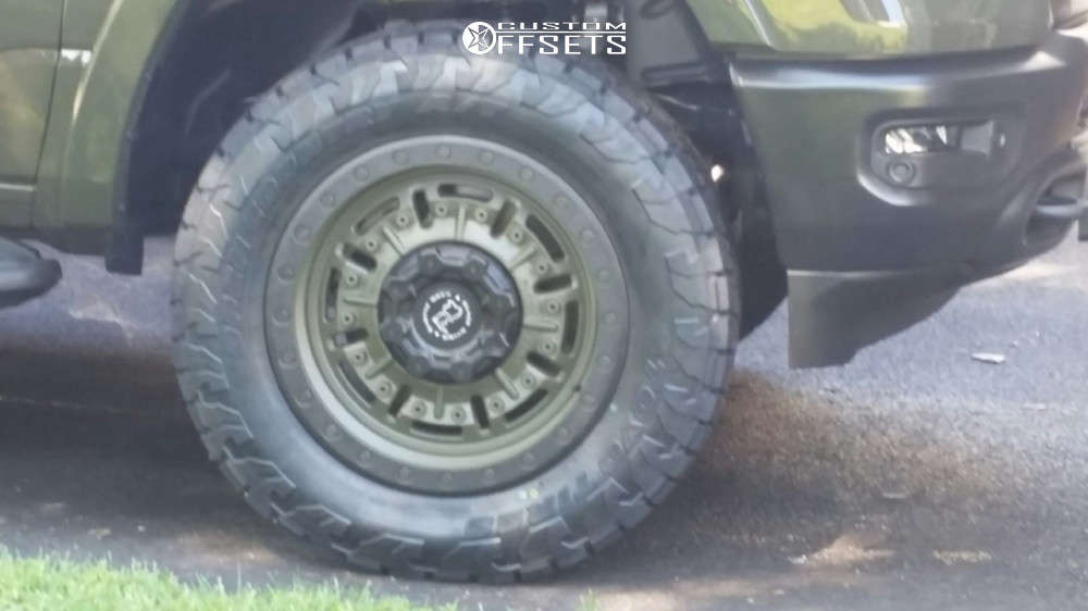 2021 Ram 1500 with 20x9.5 -12 Black Rhino Abrams and 295/60R20 Toyo ...