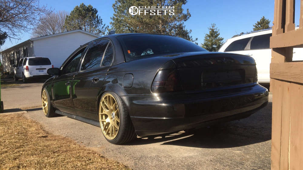 1998 Saturn SL2 with 17x8.25 25 XXR 527 and 205/40R17 Accelera All ...