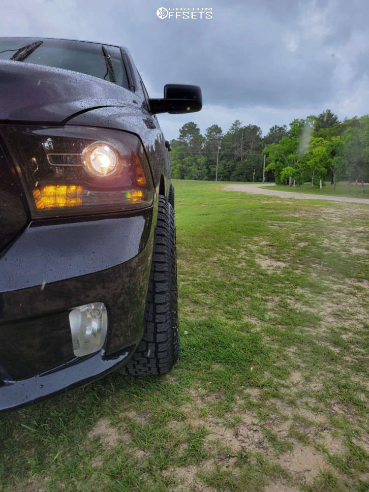 2015 Ram 1500 with 18x9 -12 Anthem Off-Road Intimidator and 275/70R18 ...