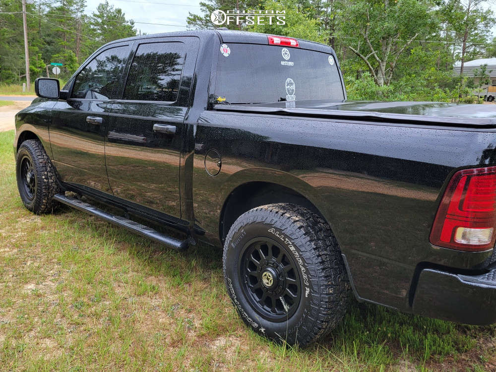 2015 Ram 1500 with 18x9 -12 Anthem Off-Road Intimidator and 275/70R18 ...