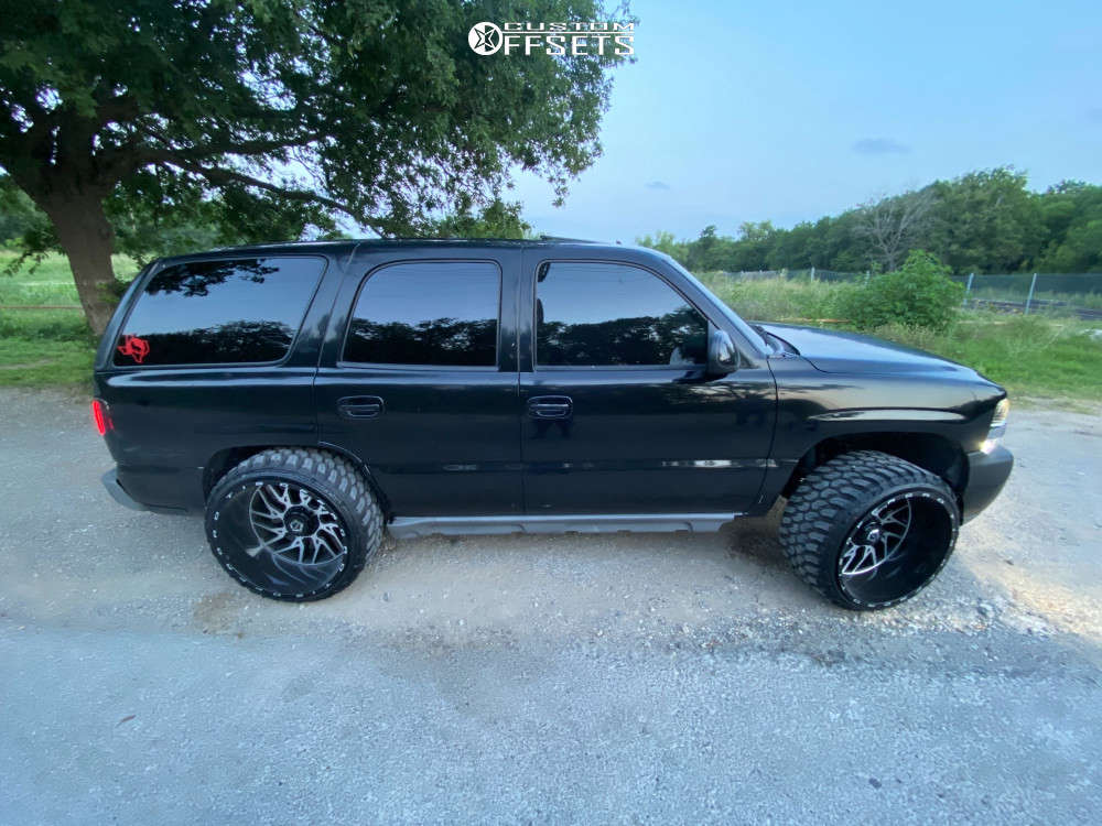 2003 Chevrolet Tahoe with 24x14 -76 TIS 544MB and 33/12.5R24 Suretrac ...