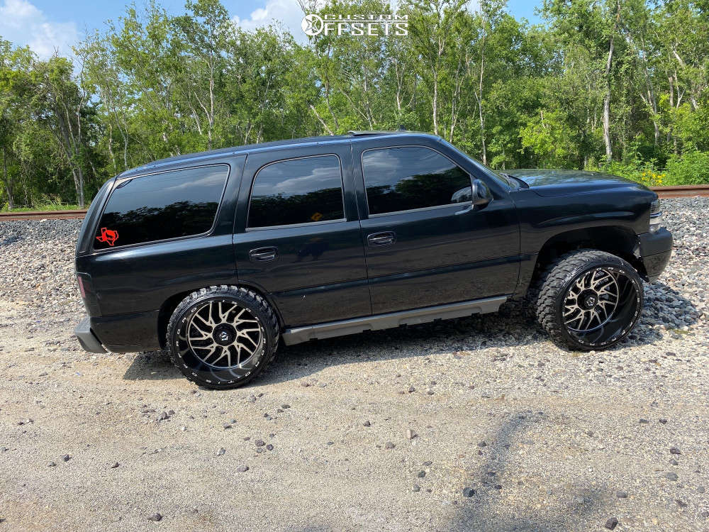 2003 Chevrolet Tahoe with 24x14 -76 TIS 544MB and 33/12.5R24 Suretrac ...